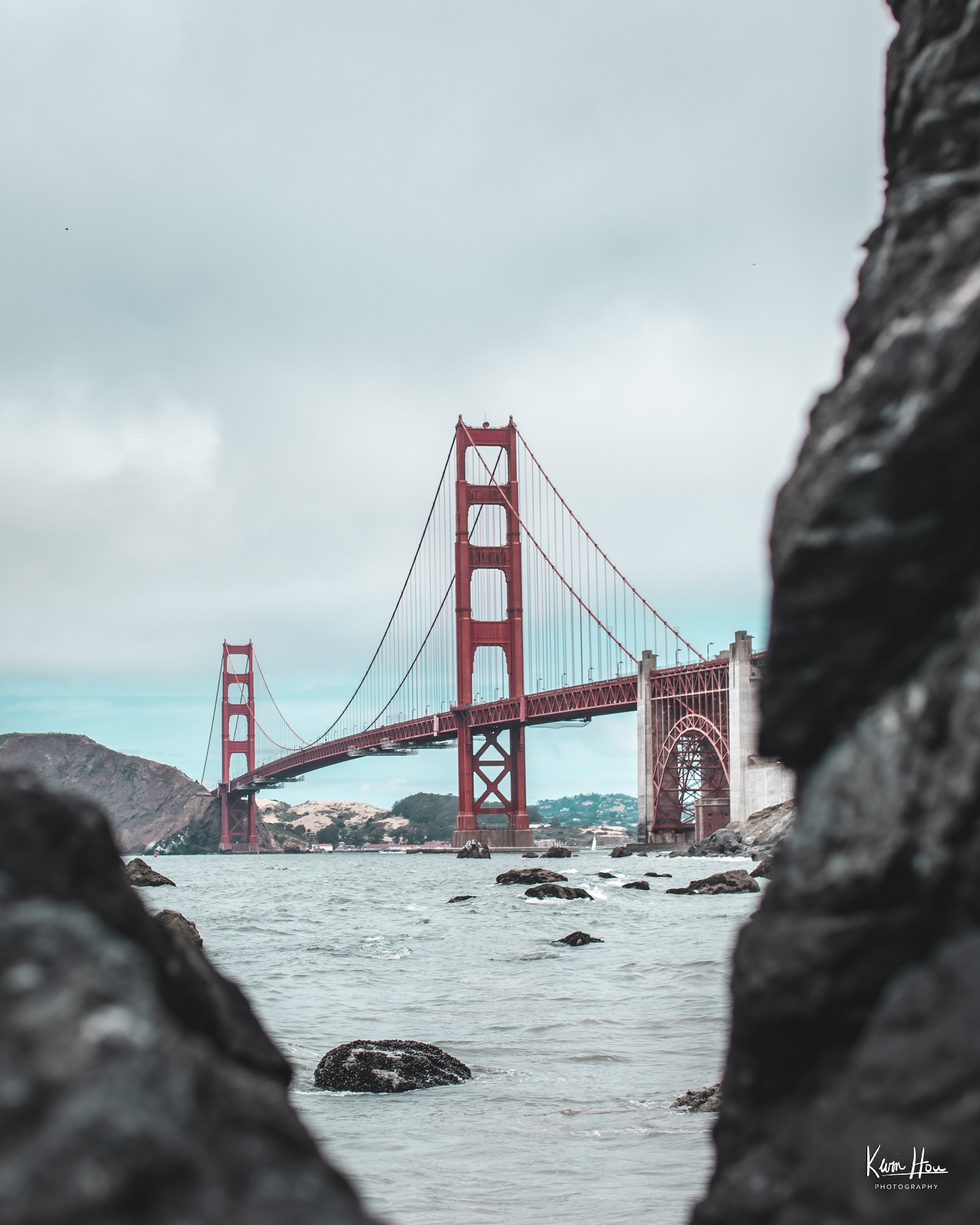 Golden Gate Bridge Peering Through Rocks | Kevin Hou Photography